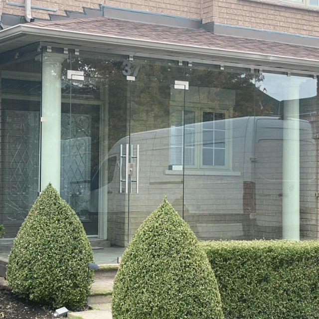 Screen for porch enclosure in Toronto. Glass, Aluminum & Metal