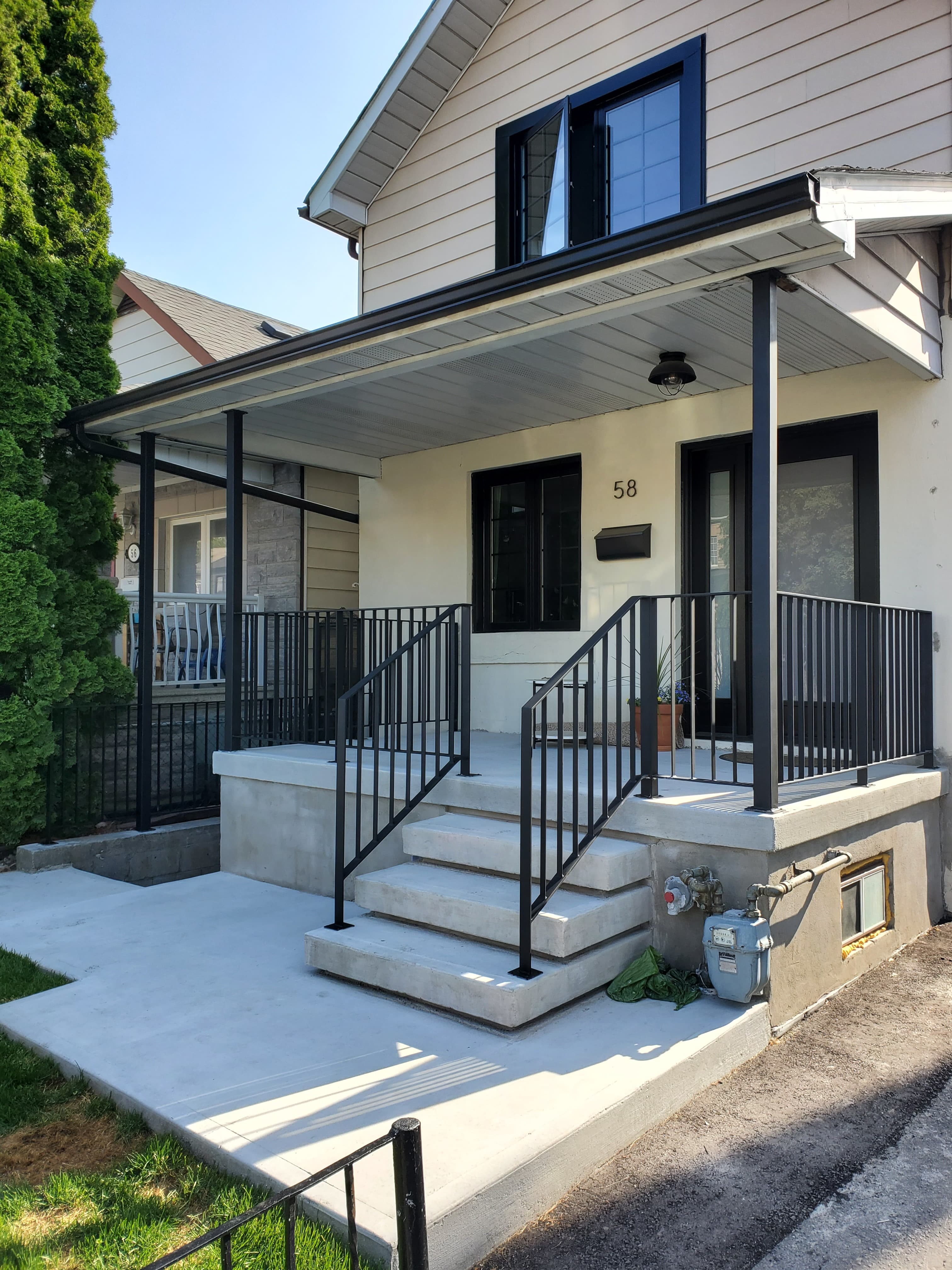 Outdoor Porch Railing Designs from Wood, Wrought Iron, and Steel