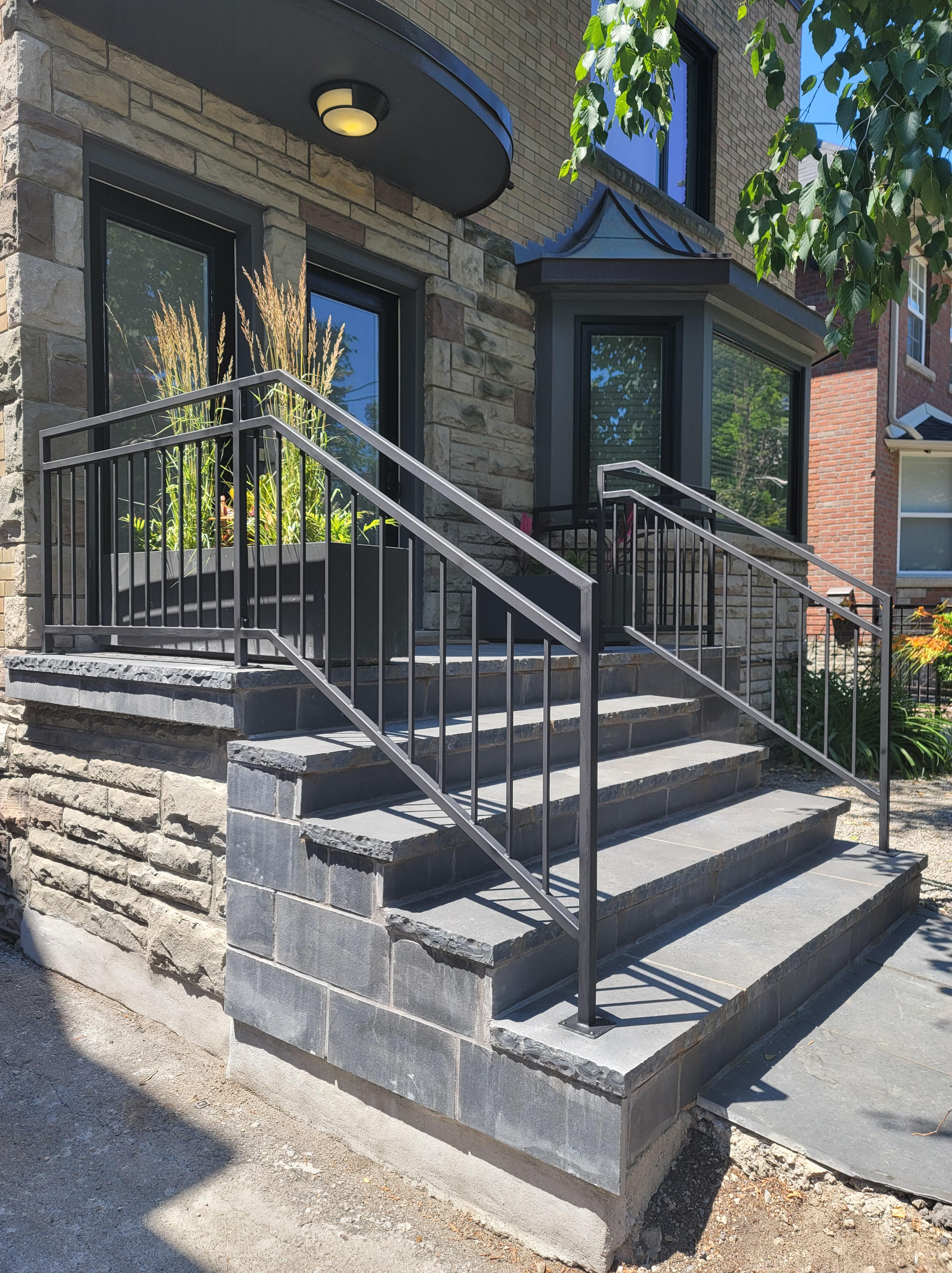 Outdoor Porch Railing Designs from Wood, Wrought Iron, and Steel