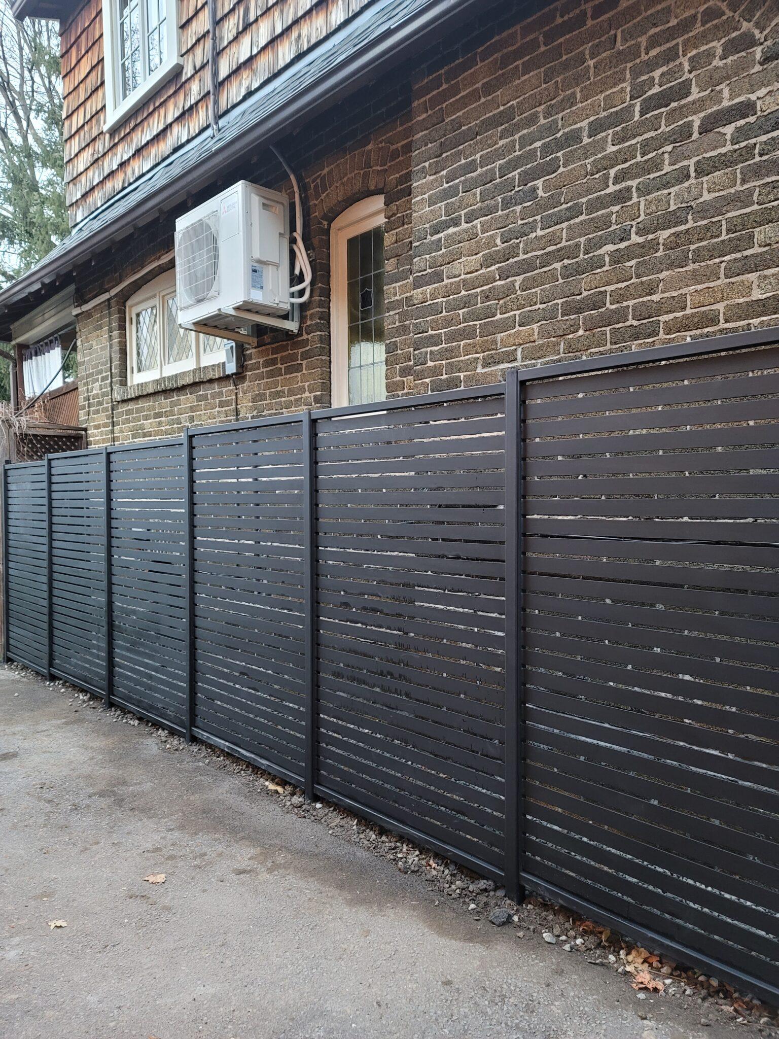 Perforated Metal Fence and Gate in Toronto. Panels, Facade