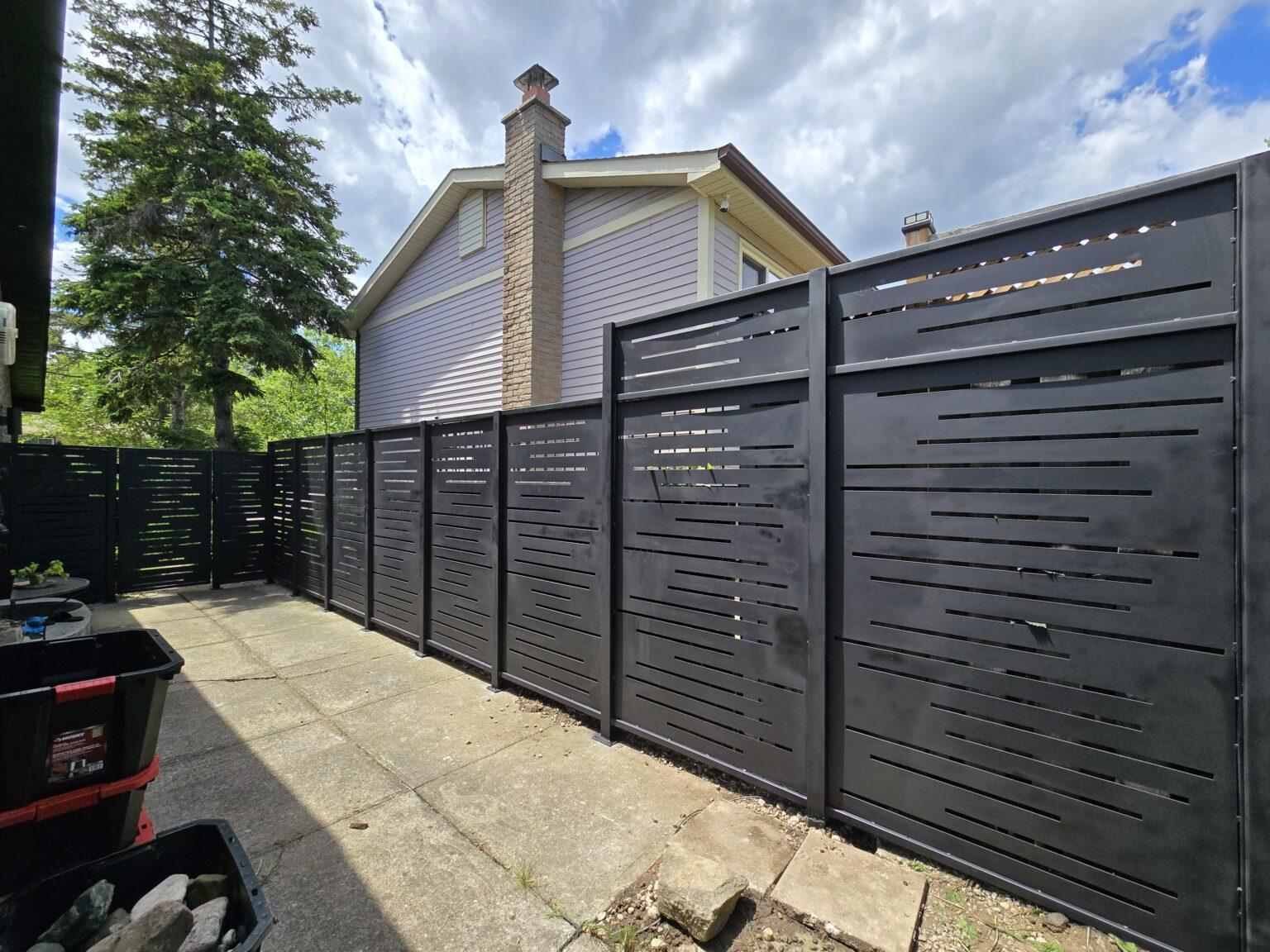 Perforated Metal Fence and Gate in Toronto. Panels, Facade